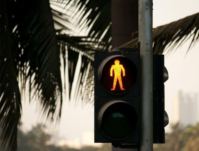 New traffic light system detects when people want to cross street ...