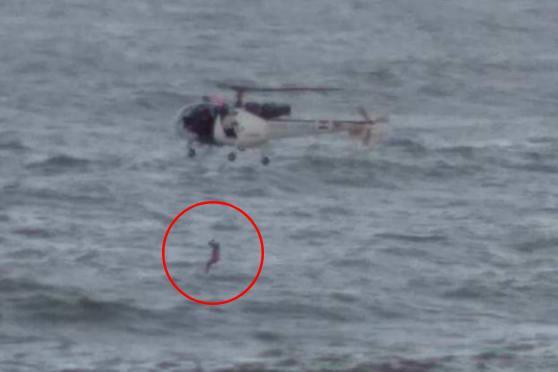 Coast Guard rescues Army officer drowning on beach; shares pics